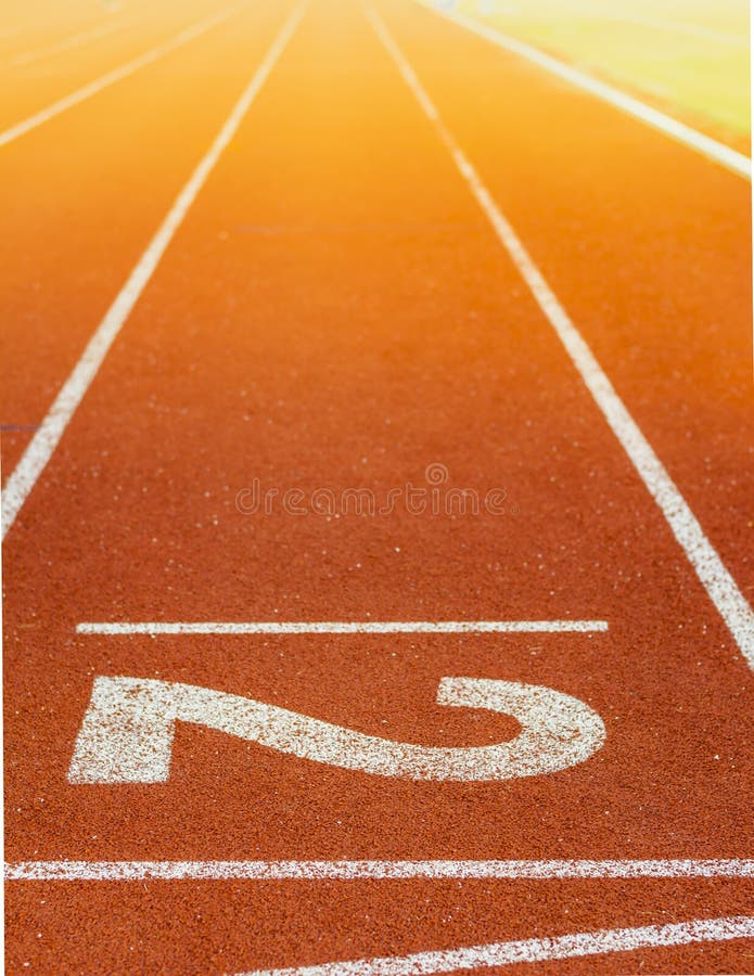 Red running track stock photo. Image of competition - 164526152