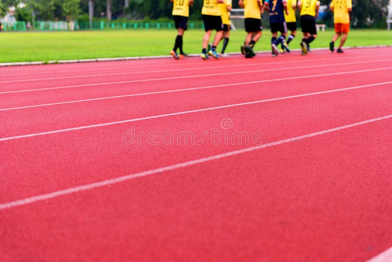 Red Running Track in Stadium Stock Image - Image of wastewater, hole ...