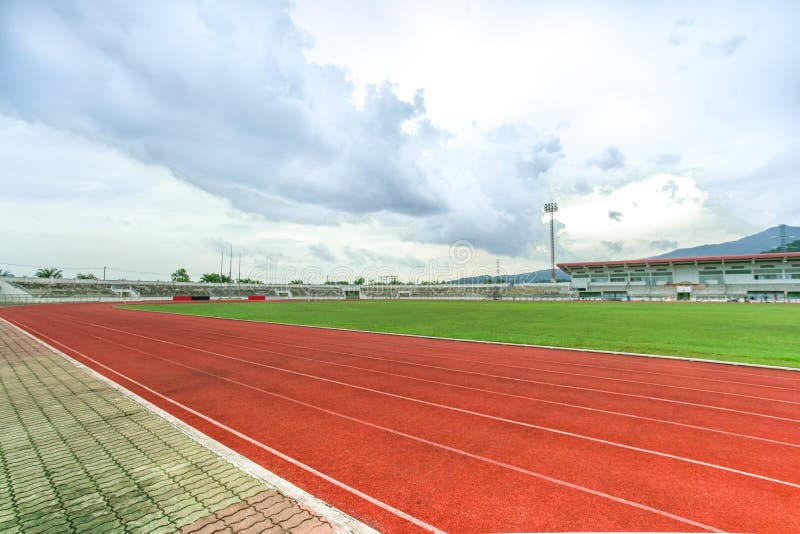 Red Running Track in the Stadium Stock Image - Image of spotlight ... Red Running Track in the Stadium Stock Image - Image of spotlight ...