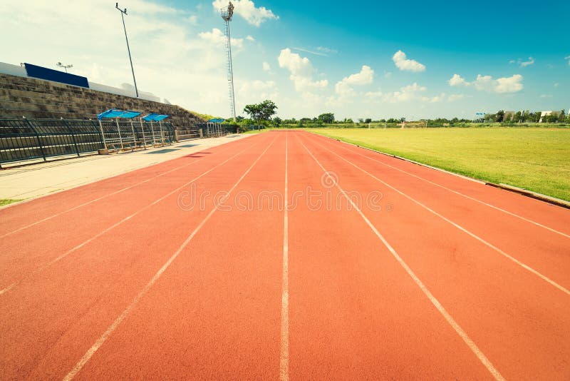 Red Running Track in Stadium. Running Track on Blue Sky. Stock Photo ... Red Running Track in Stadium. Running Track on Blue Sky. Stock Photo ...
