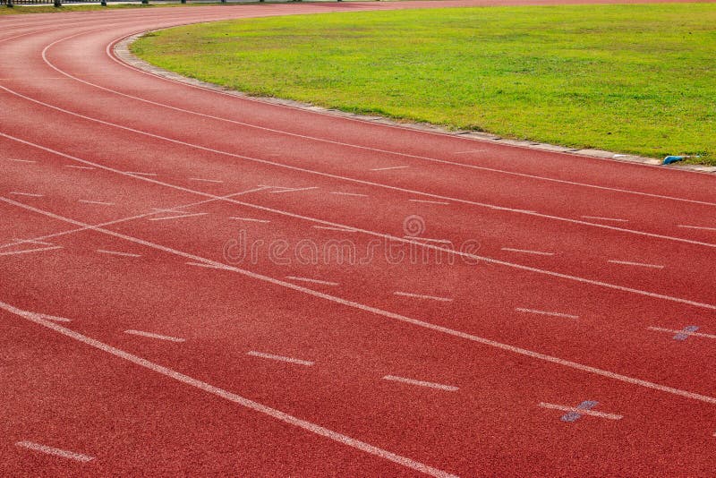 Red Running Track Synthetic Rubber on the Athletic Stadium Stock Photo ...