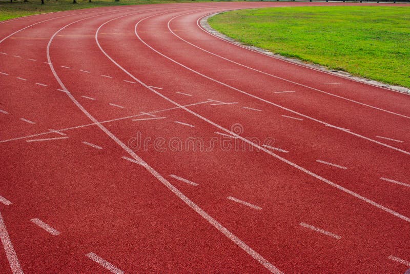 Red Running Track Synthetic Rubber on the Athletic Stadium Stock Photo ...