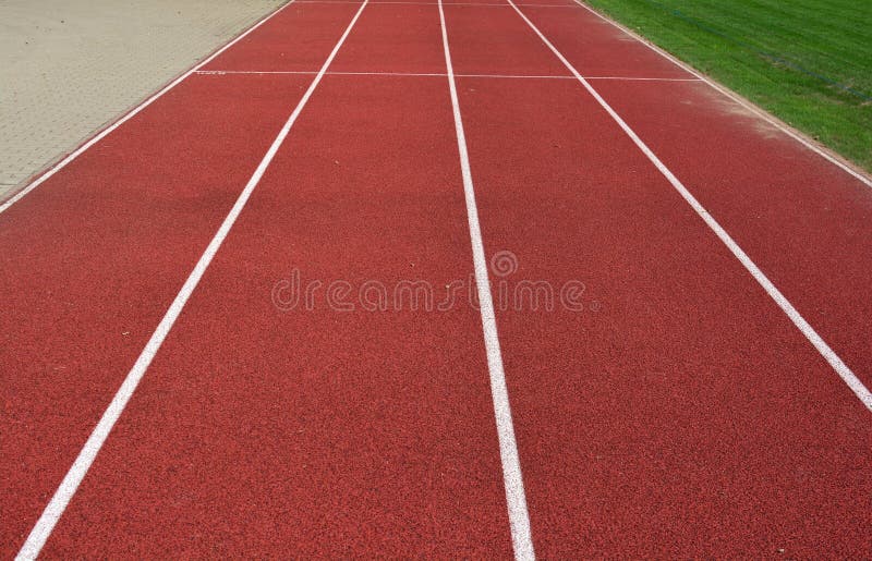 Red Running Track with White Lines, Footpath in Left Side and Green ...