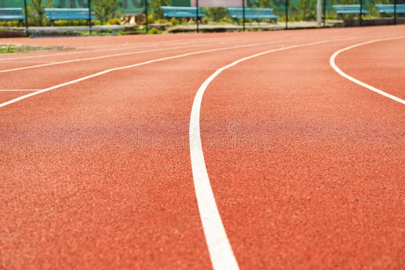 Red Running Track with White Lines Outdoor Stock Image - Image of ...