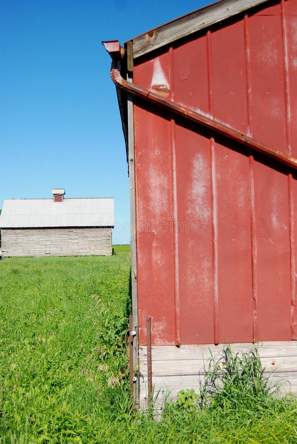 A Red Rural Barn on Farmland Stock Photo - Image of spring, barn: 21707136
