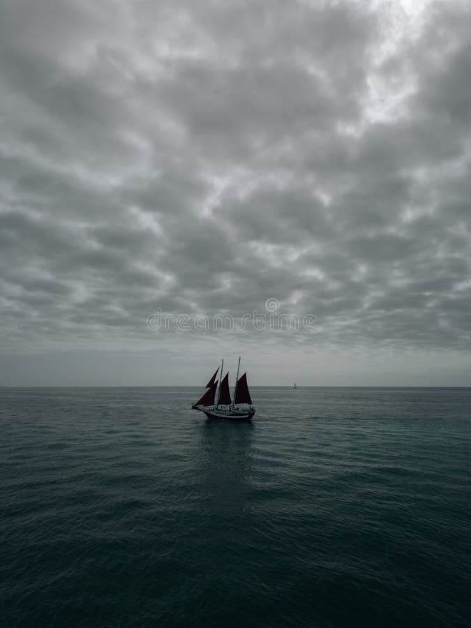 The Boat at Horizon in the Ocean Stock Photo - Image of ocean, sunset ...