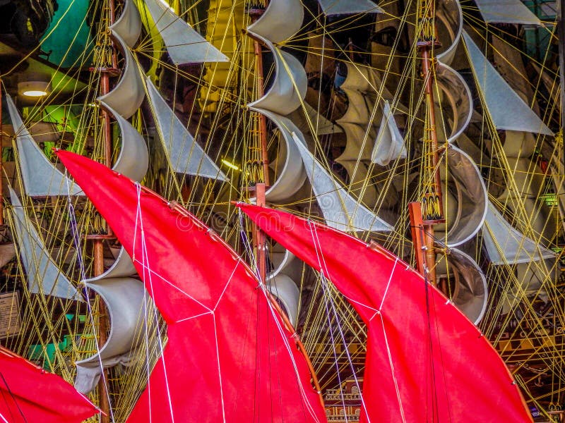 Red Sails in Front of Large Group of White Sails of Old Style Sailing ...