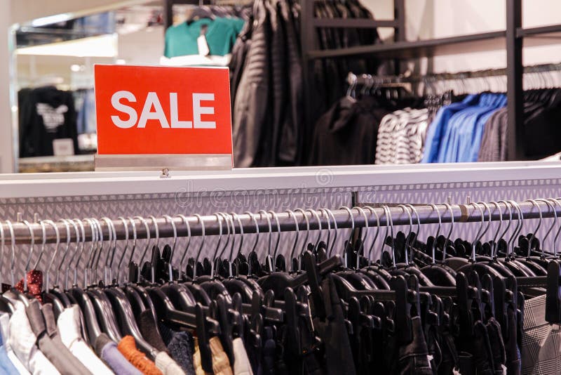 Red Sale Signboard in a Clothing Store Stock Photo - Image of 10072019 ...