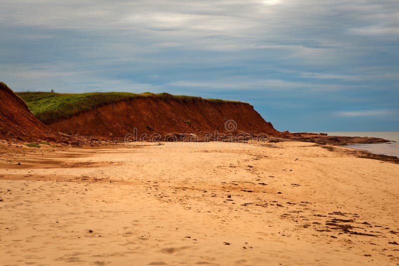Red Sand Shores of Prince Edward Island Stock Photo - Image of house ...