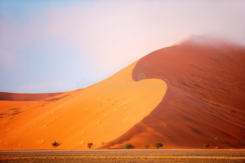 Red sand dunes of Namibia stock image. Image of africa - 153838173