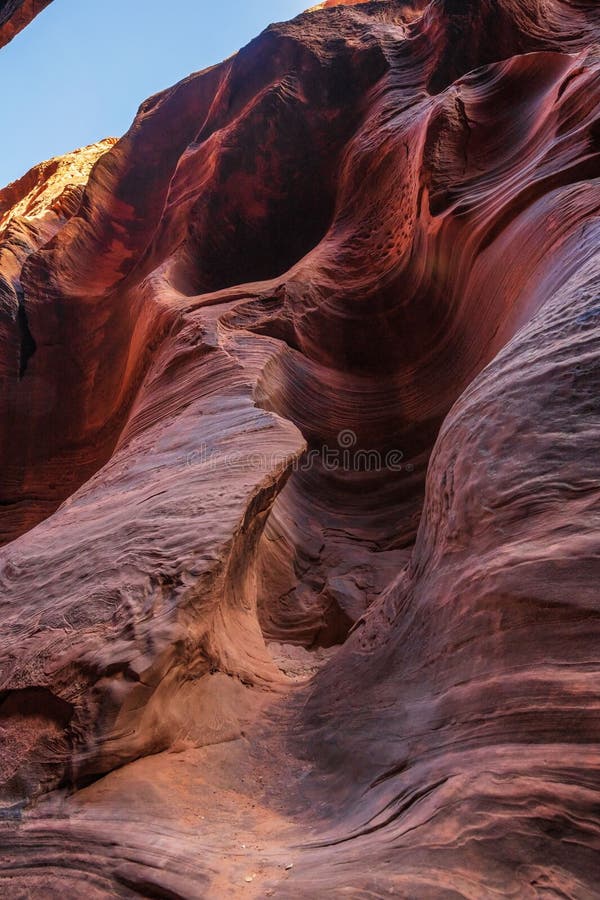 Red Sandstone Rocks at the Utah Canyons, with a Blue Sky and White ...