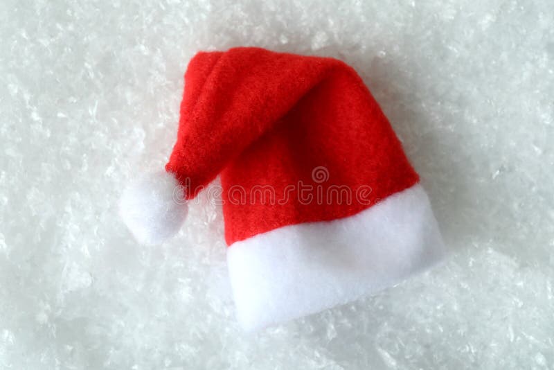 Red Santa Hat on Decorative Snow Background Stock Image - Image of year ...