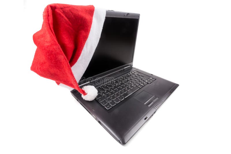 Red Santa Hat on the Notebook Computer Stock Photo - Image of ...