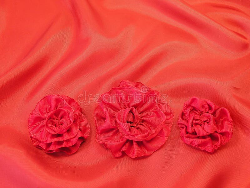 Red satin and flowers stock photo. Image of textures - 15682854