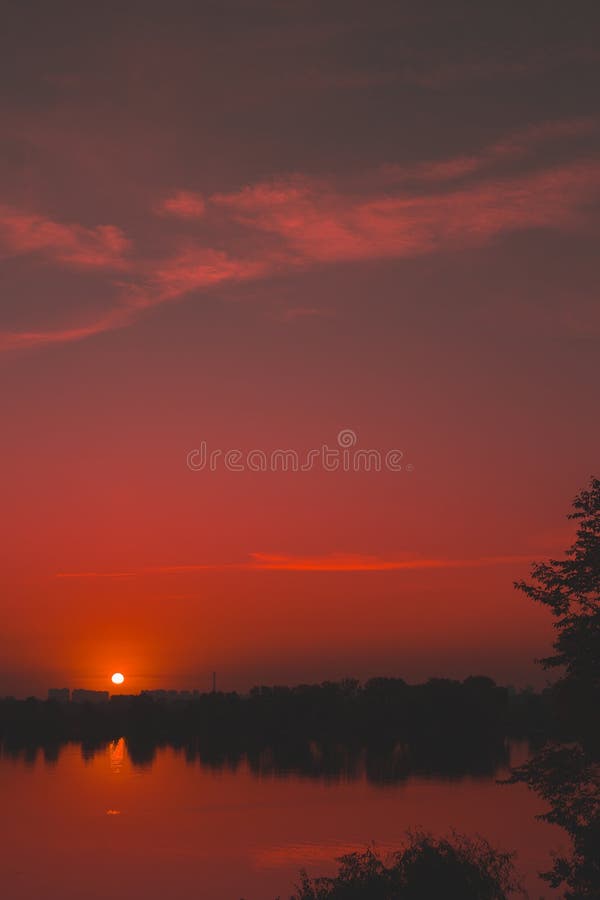Red Saturated Sunset on the River Stock Image - Image of beach, orange ...
