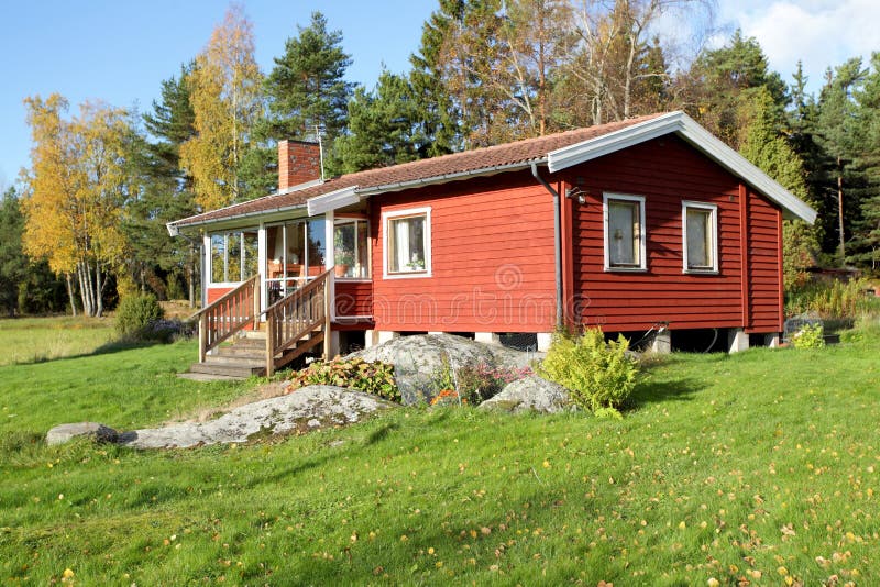 Red cottage by lake stock photo. Image of cottage, travel - 30708024