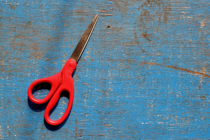 Red Scissors on a Blue Background. Stock Photo - Image of paper ...