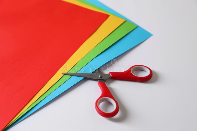 Red Scissors and Color Sheets of Paper on White Background Stock Image ...