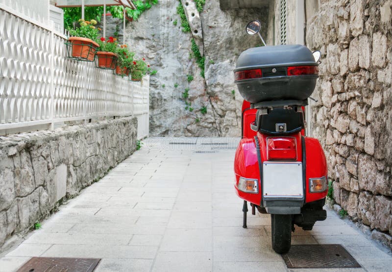 Red scooter. stock image. Image of lifestyle, motorbike - 130179221