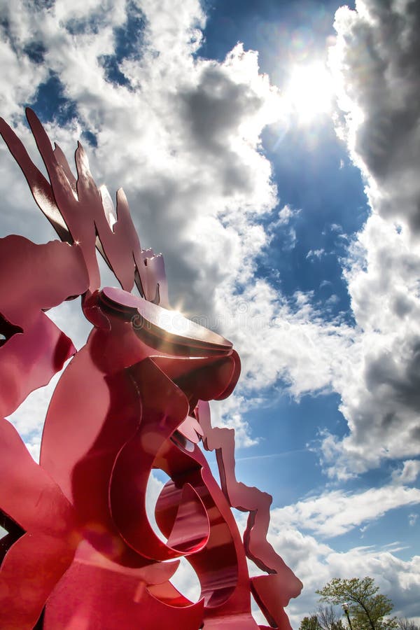 Red Sculpture in Front of a Cloudy Sky Editorial Stock Photo - Image of ...