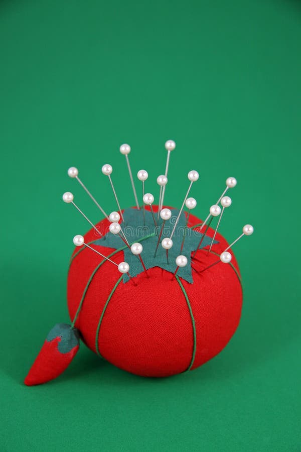 Red sewing pincushion stock photo. Image of tomato, green - 10398984