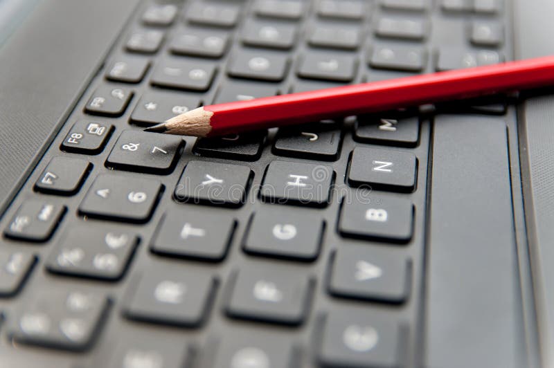 Red Sharp Pencil on Laptop Keyboard. Stock Image - Image of design ...