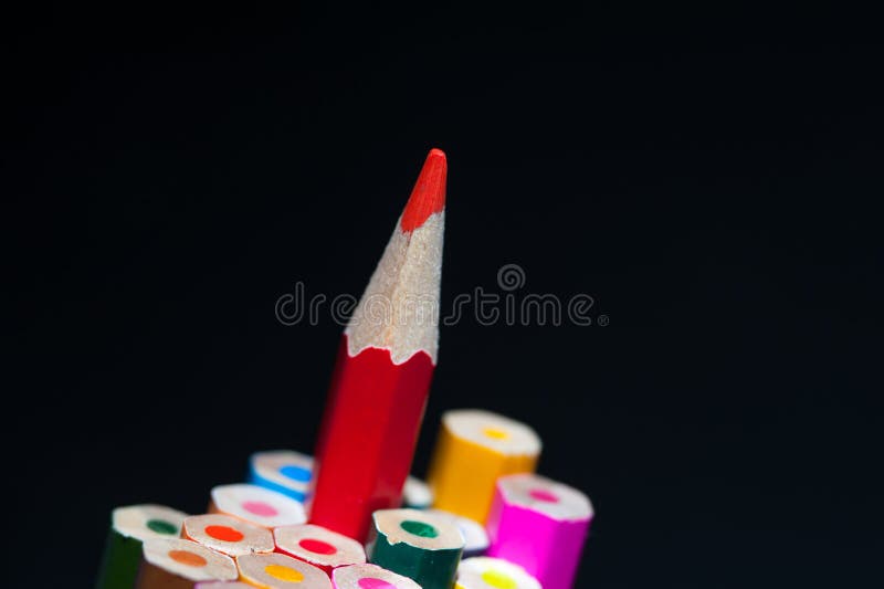 Red Sharpened Pencil among Colorful Crayons. Stock Image - Image of ...