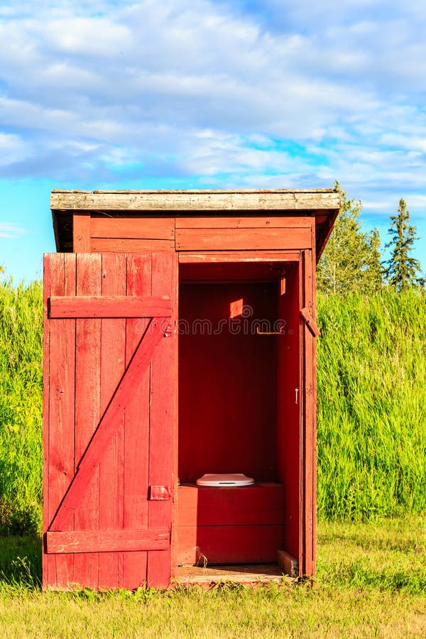 A Red Shed with a Toilet Inside Stock Photo - Image of latrine ...