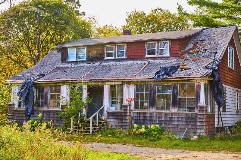 Red Shingles Falling Off Old Abandoned House with Black Tarp Broken ...