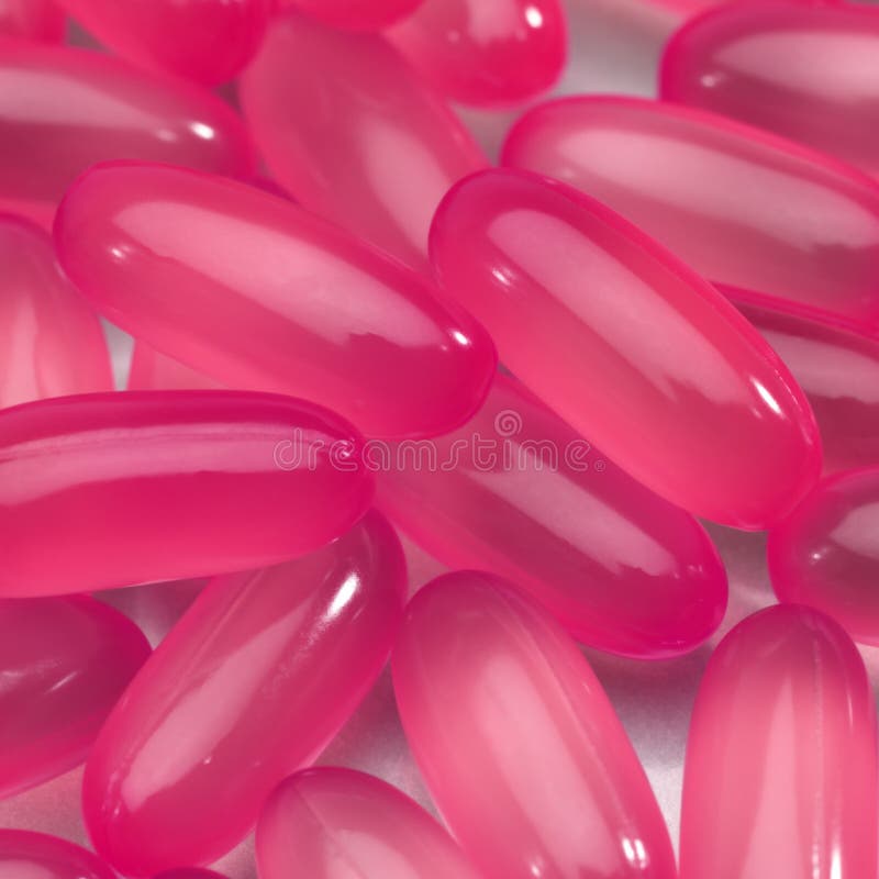 Red shiny gel pills stock image. Image of blue, healthy - 1531059