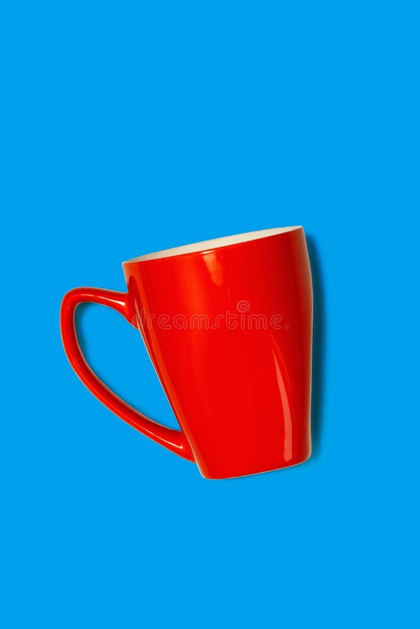 Red Shiny Mug with a Shadow on a Plain Background Stock Photo - Image ...