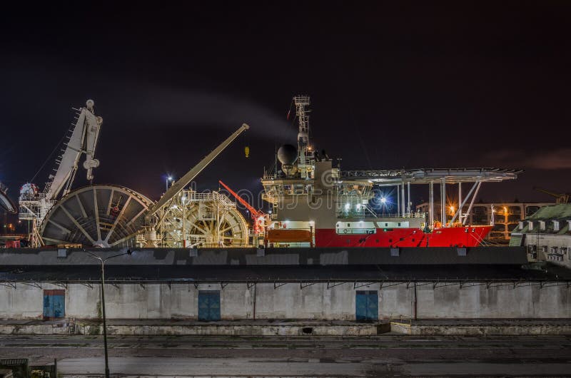 RED SHIP with a HELIPAD stock image. Image of night - 369454123