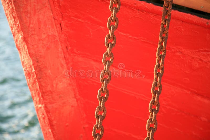 Red ship hull and chain stock image. Image of cruise - 73866987