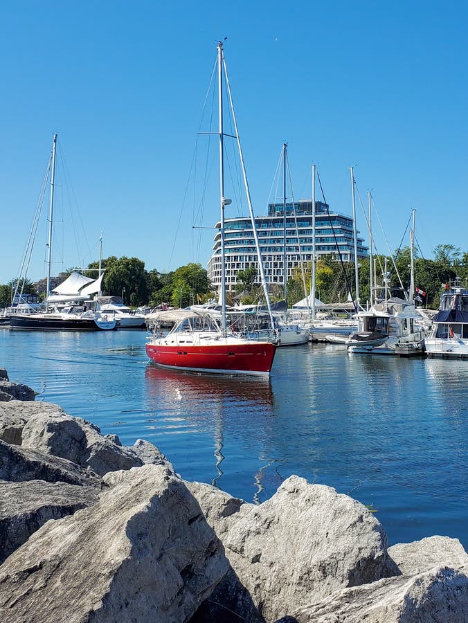 A Red Ship Start Sailing on the Lake. Editorial Stock Image - Image of ...