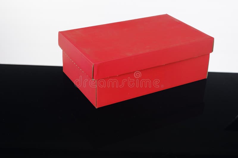 Red shoe box black floor stock photo. Image of object - 127490880
