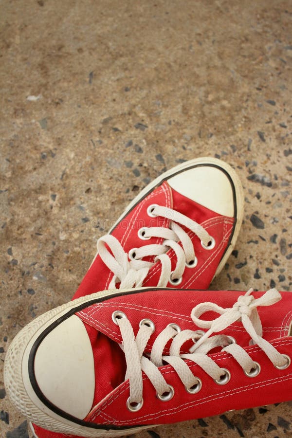 Red Shoes on the Floor of Cement. Stock Image - Image of black, empty ...