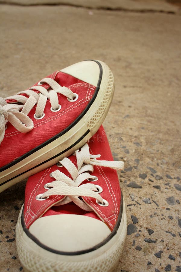 Red Shoes on the Floor of Cement. Stock Photo - Image of street, jeans ...