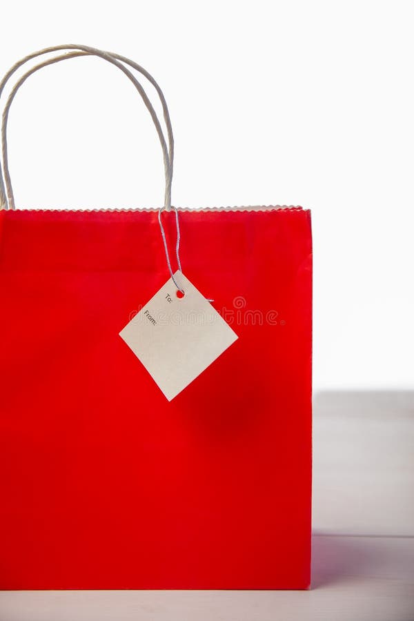 Red Shopping Gift Bag with Tag Stock Image - Image of shopping, present ...