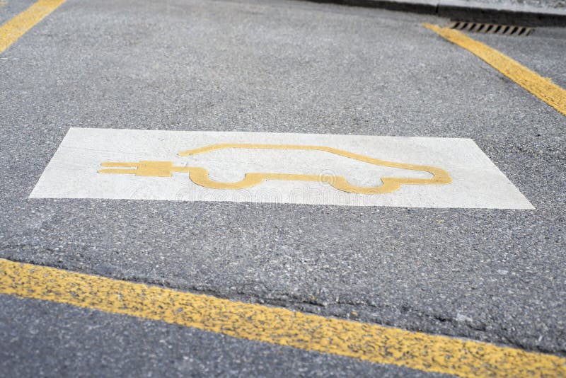 Red Sign of a Car on the Ground of the Parking Lot Stock Photo - Image ...