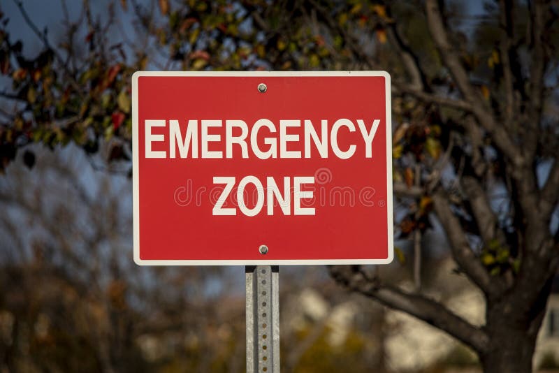 Red Sign with White Letters Stating Emergency Zone Stock Photo - Image ...