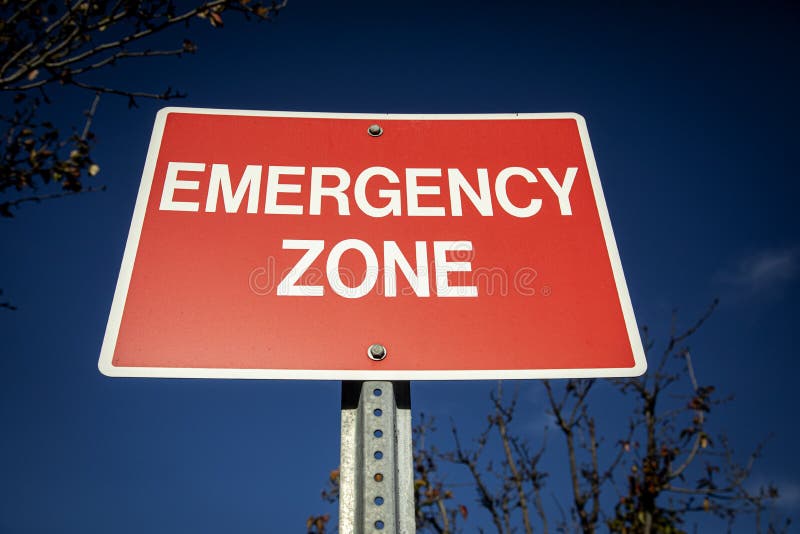 Red Sign with White Letters Stating Emergency Zone Stock Photo - Image ...