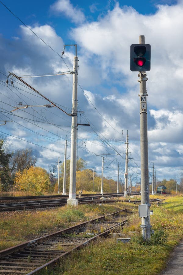 Red Signal of Semaphore and Stop Sign in Front of Railroad Crossing ...