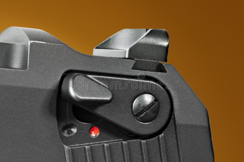 Red Signalling the Safety Off on a Semi Automatic Pistol Stock Photo ...