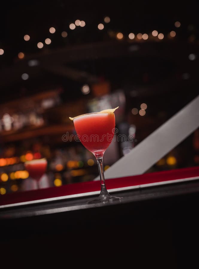 Red Signature Cocktail in the Dark Bar Stock Image - Image of dark ...