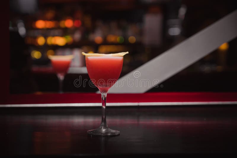 Red Signature Cocktail in the Dark Bar Stock Photo - Image of bokeh ...