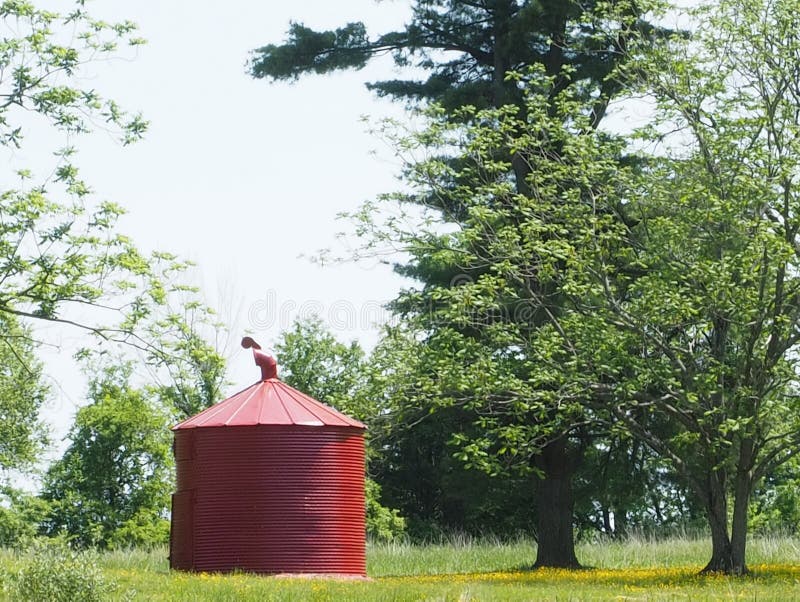 The Red Silo is Near the Trees on this Farm. Stock Photo - Image of ...