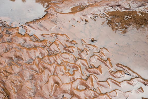 Red silt stock photo. Image of puddle, clay, reddish, ripples - 2131288