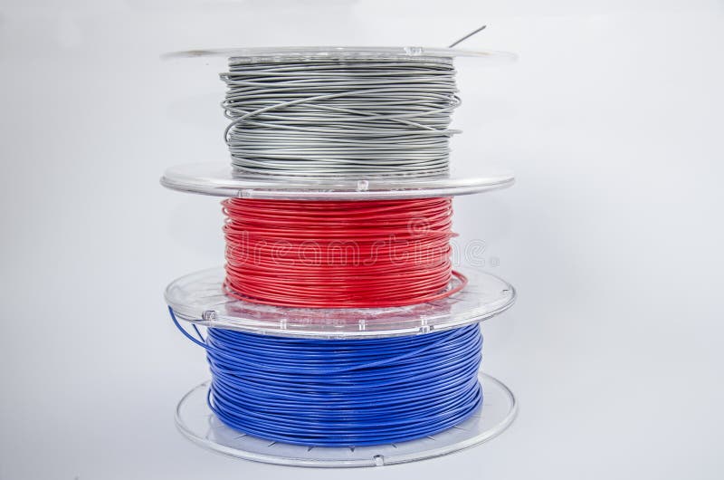 Red, Silver And Blue Plastic Filament Coils For 3d Stock Photo - Image ...