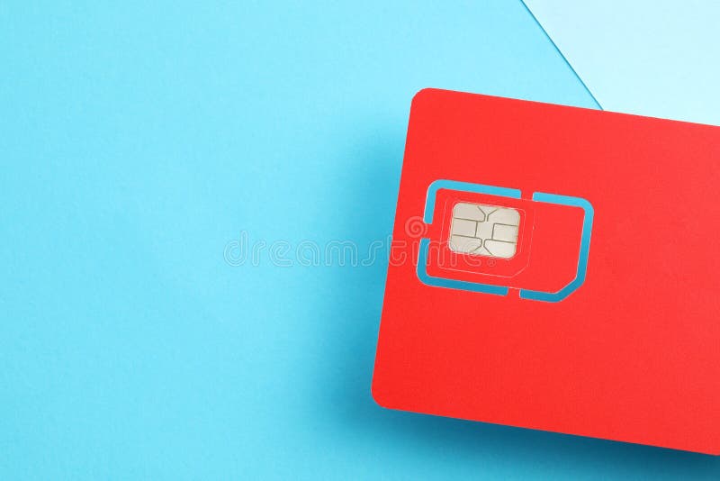 Red SIM Card on Color Background, Top View. Space for Text Stock Photo ...
