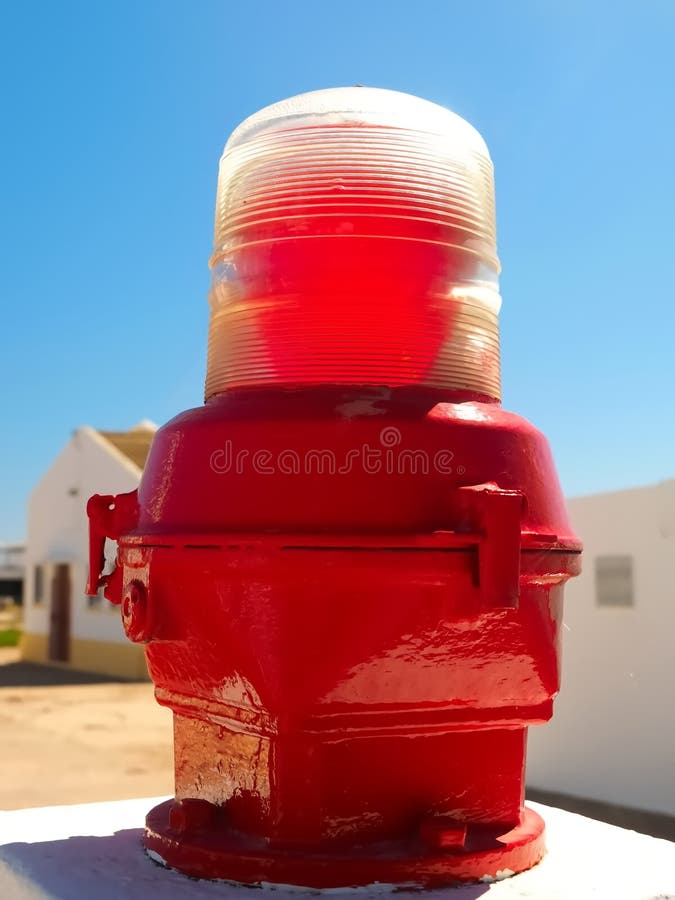 Red Siren or Traffic Light at a Lighthouse for Navigation Stock Image ...